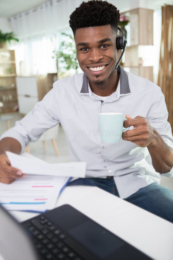 Happy Man Drinking Coffee and Working on Laptop from Home Stock Image ...