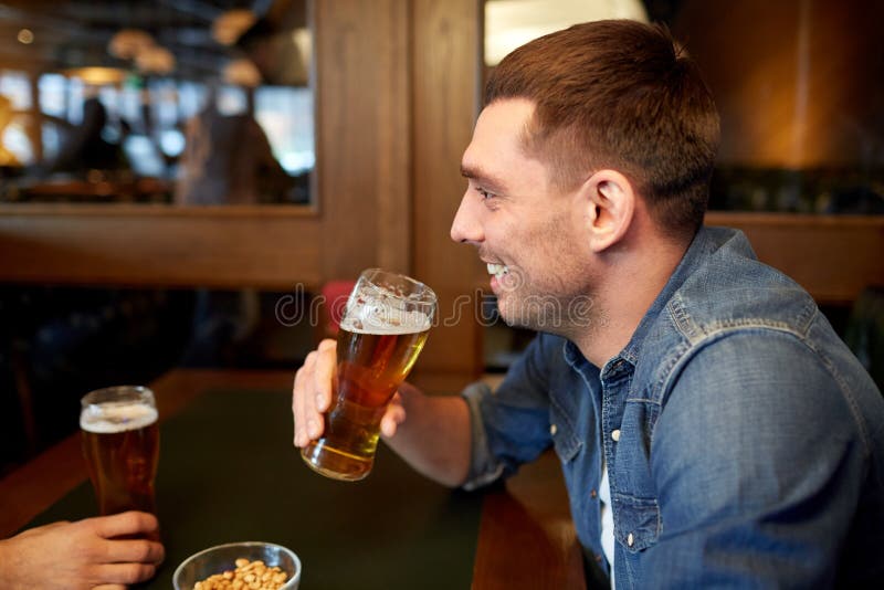Happy Man Drinking Draft Beer at Bar or Pub Stock Photo - Image of ...