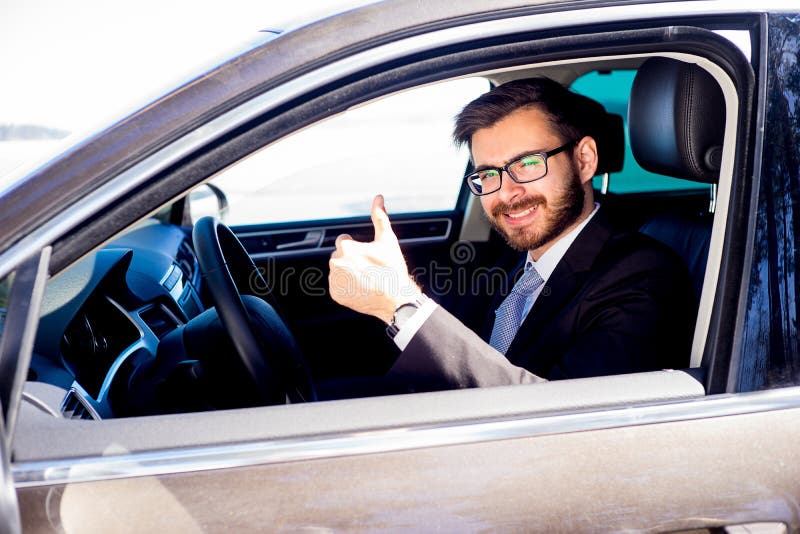Happy man driving a car stock image. Image of black, driver - 94681993