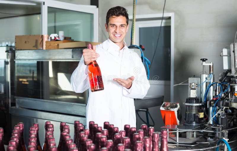 Happy Man Employee Standing in Final Section of Wine Production on ...