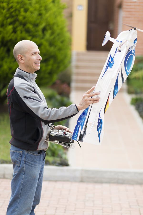 Happy Man Enjoying Model Airplane Stock Photo - Image of radio ...