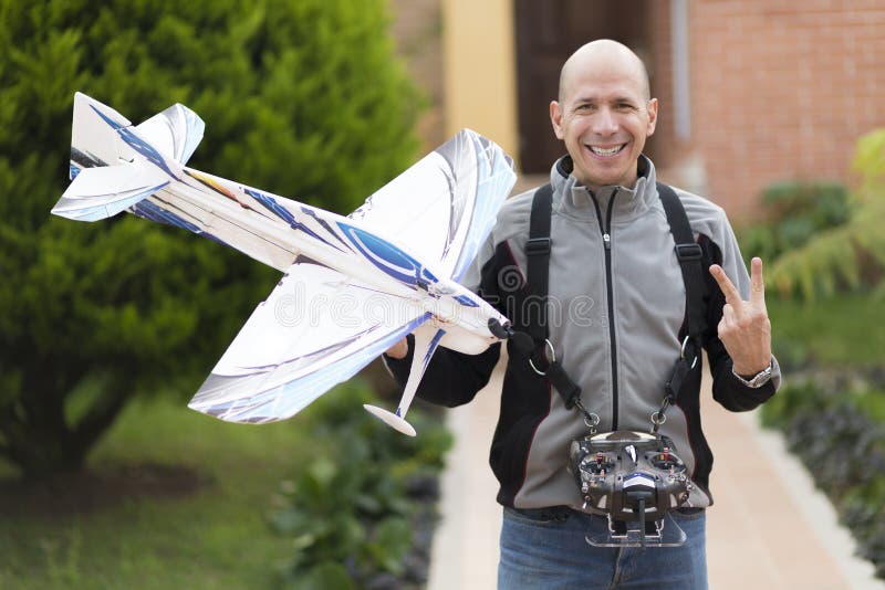 Happy Man Enjoying Model Airplane Stock Photo - Image of male, hobby ...