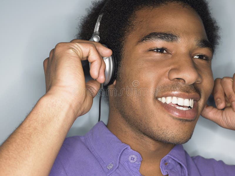 Happy Man Enjoying Music stock photo. Image of horizontal - 29656662
