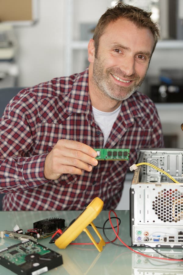 Happy Man Fixing Electronics Stock Photo - Image of technician ...