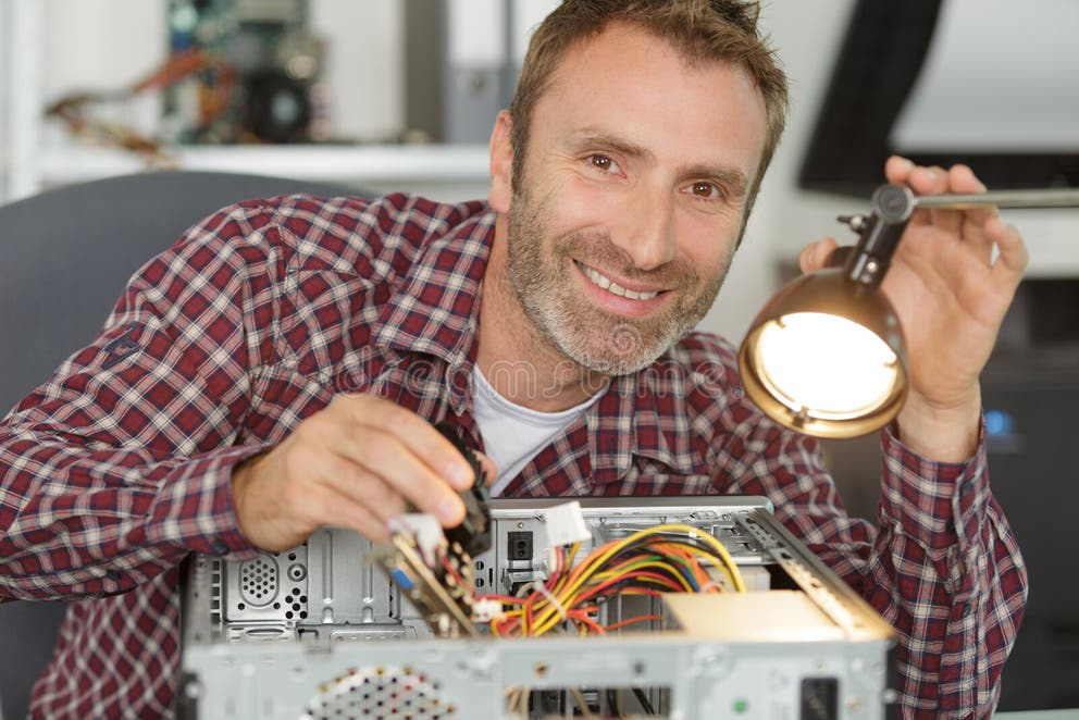 Happy man fixing pc stock image. Image of repairing - 152077869