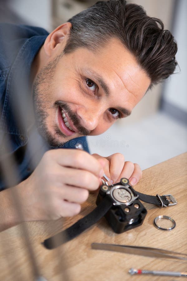 Happy Man Fixing Watch Parts Stock Image - Image of clock, blue: 263612079