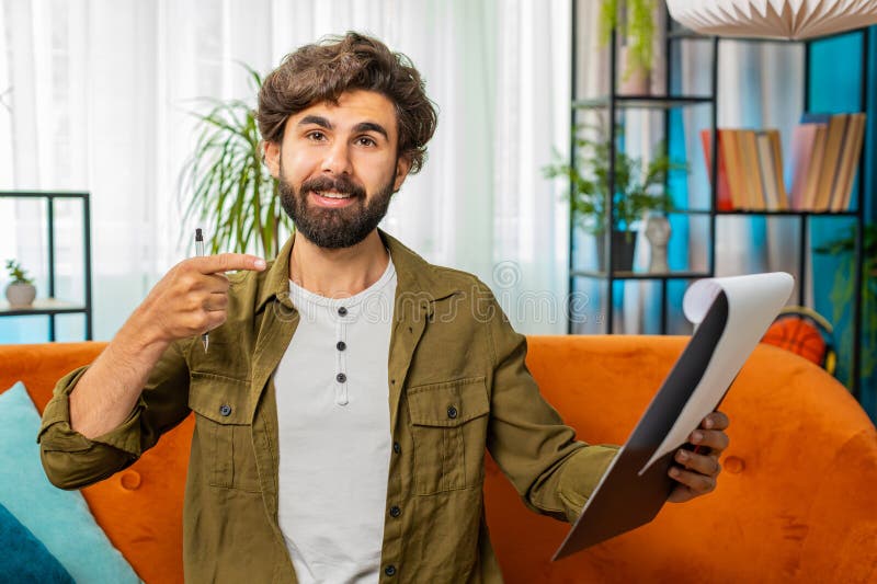 Happy Man Freelancer Work with Documents from Home, Analyzing ...