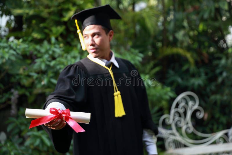 Happy Man Graduated Holding and Showing Degree, Idea for Education ...