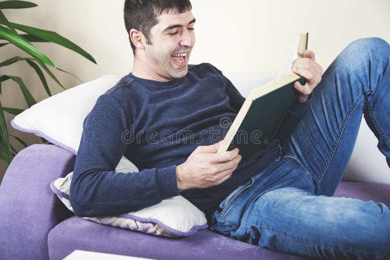 Happy man hand book stock photo. Image of book, home - 143289388