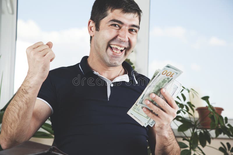 Happy man hand money stock image. Image of success, holding - 145506975
