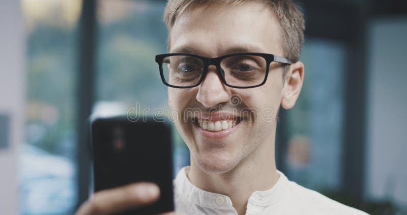 Happy Man Having a Video Call with His Smartphone Stock Image - Image ...