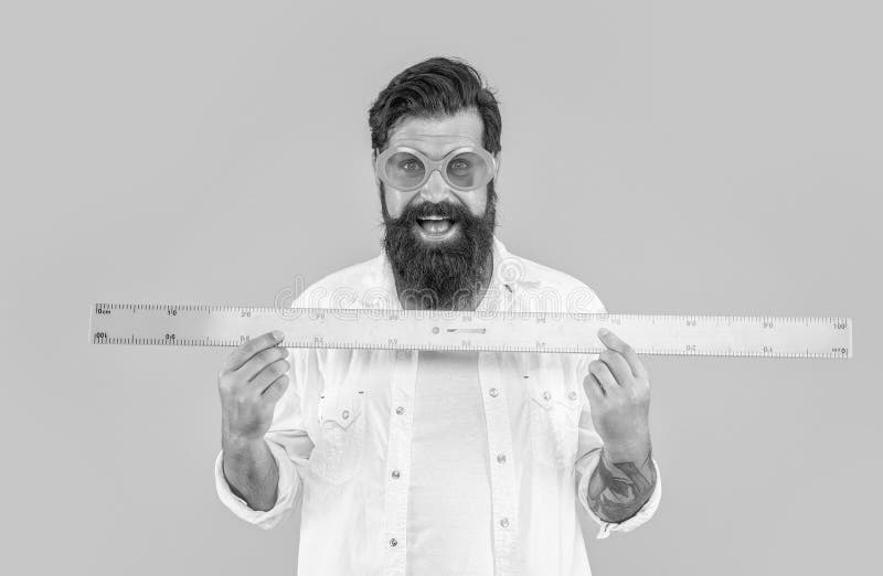 Happy Man Hold Geometry Ruler Isolated on Yellow. Man Hold Geometry ...