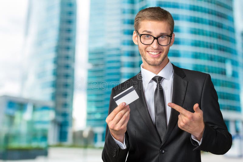 Happy Man Holding Credit Card Stock Image - Image of isolated, person ...