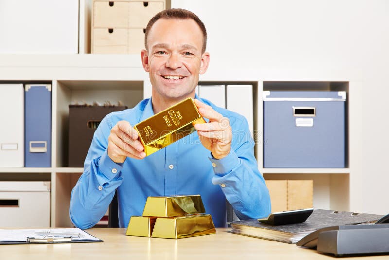Happy Man Holding Gold Bars in Office Stock Image - Image of assets ...