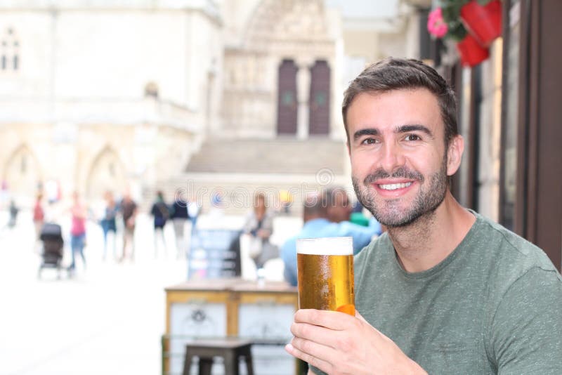 Happy Man Holding His Cold Refreshing Beer Stock Photo - Image of ...