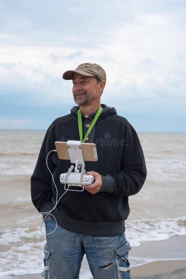 Happy Man Holds the Remote Controller of Drone Stock Photo - Image of ...
