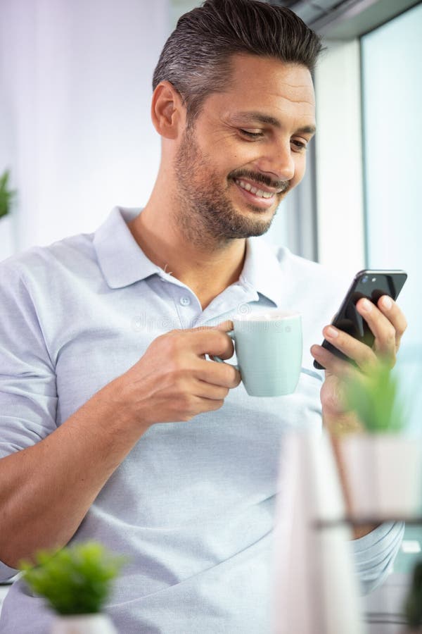 Happy Man at Home Connected on Smartphone Stock Photo - Image of ...