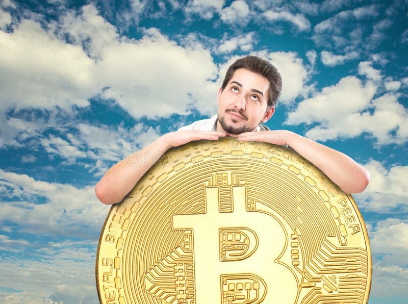 A Happy Man with a Huge Bitcoin Coin on a Beautiful Sky Stock Image ...