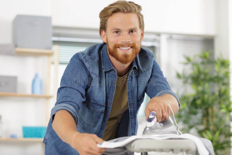 Happy Man Ironing Clothes with Iron Stock Image - Image of muscle ...