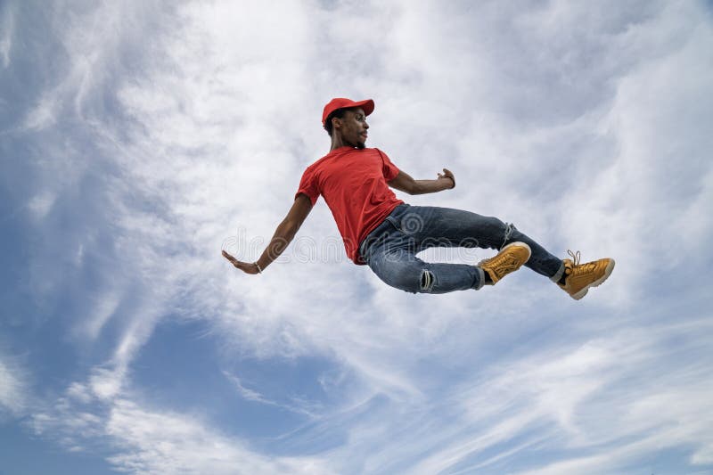 A Boy is Jumping on a Blue Rope Doing Sports Stock Photo - Image of ...