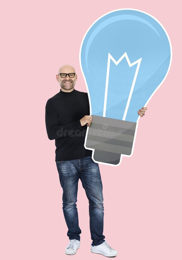 Happy Man with a Light Bulb Icon Stock Image - Image of creativity ...