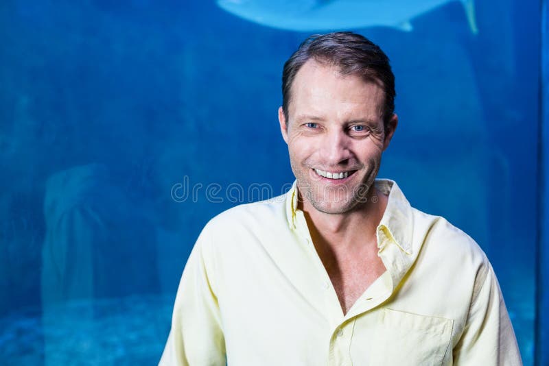 Happy Man Looking Camera Fish Tank Stock Photos - Free & Royalty-Free ...