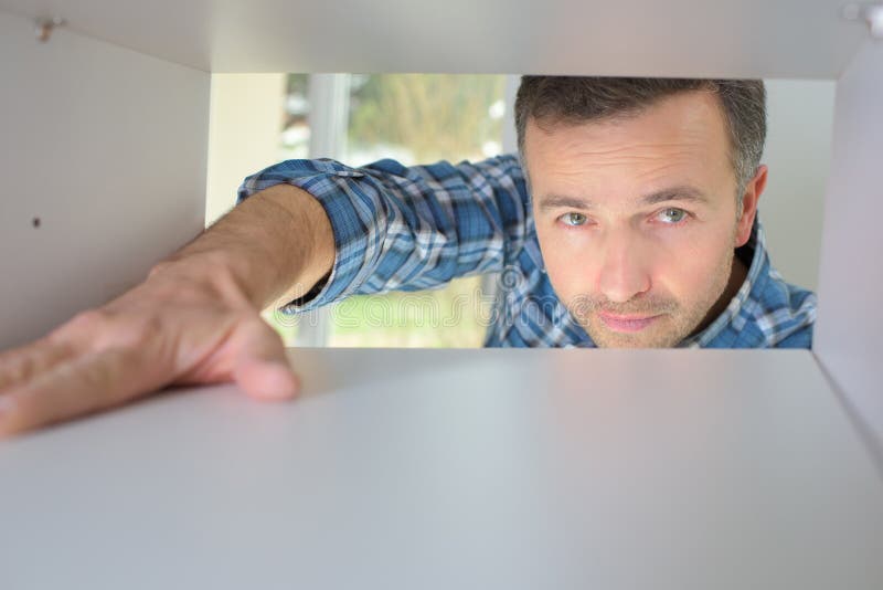 Happy Man Looking Inside Box Stock Image - Image of unpacking ...
