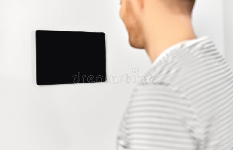 Happy Man Looking at Tablet Computer at Smart Home Stock Image - Image ...