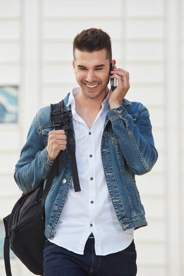 Happy Man on Mobile Phone Call Standing and Laughing Stock Image ...