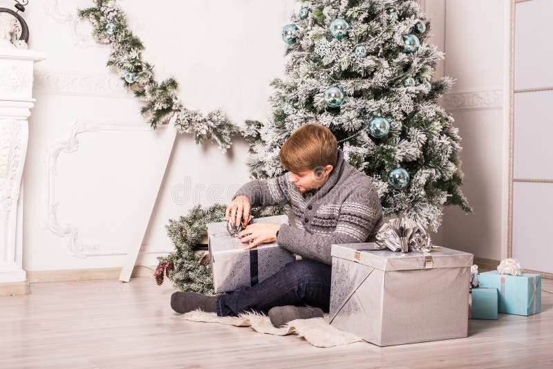 194 Man Opening Gift Couch Christmas Stock Photos - Free & Royalty-Free ...