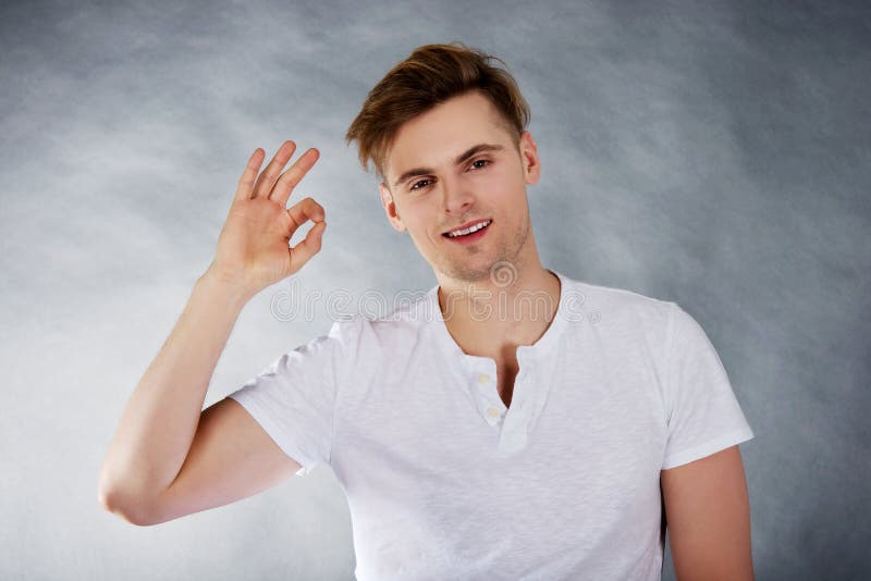 Happy Man with Perfect Hand Sign Stock Photo - Image of grey, smile ...