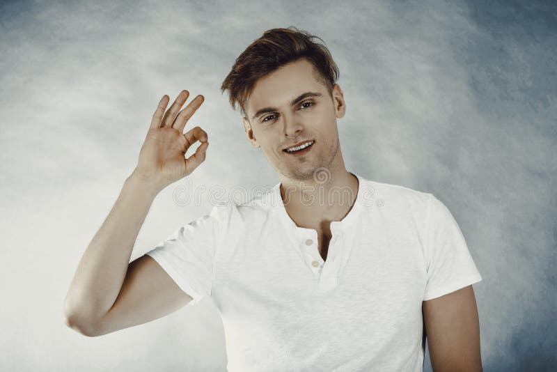 Happy Man with Perfect Hand Sign Stock Photo - Image of grey, smile ...