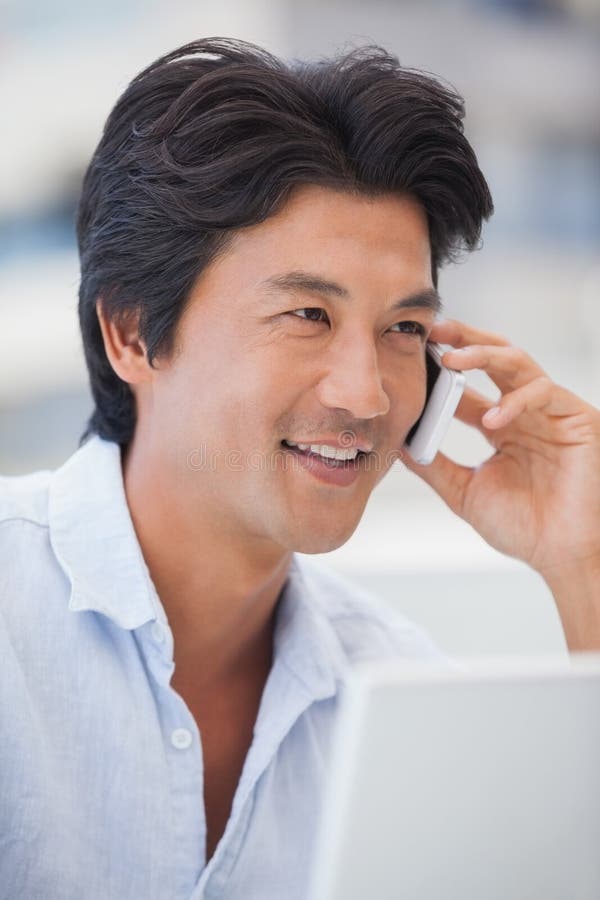 Happy man on a phone call stock photo. Image of person - 39429660