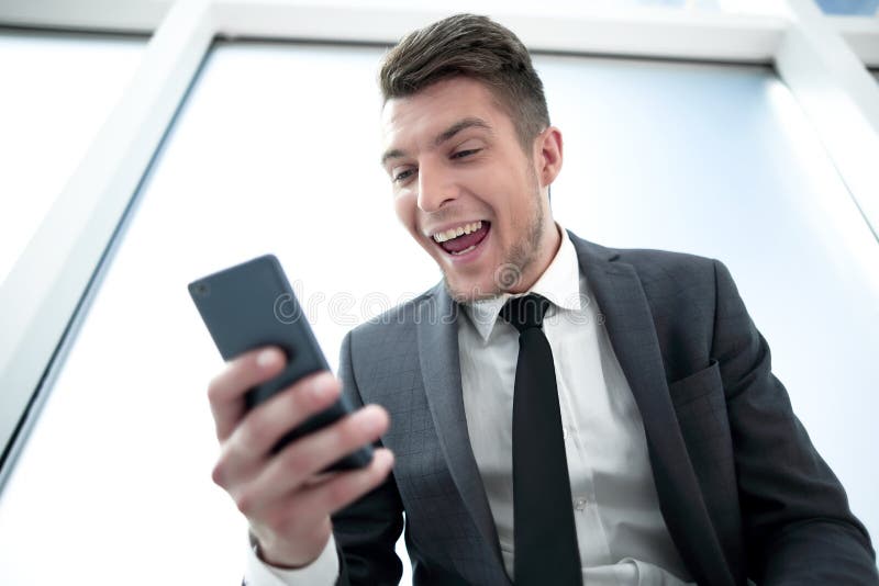 Happy man with phone stock image. Image of mobility - 199477307