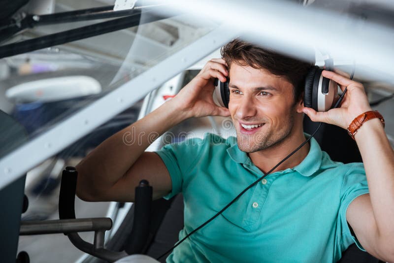 Happy Man Pilot Sitting in Cabin of Small Plane Stock Photo - Image of ...
