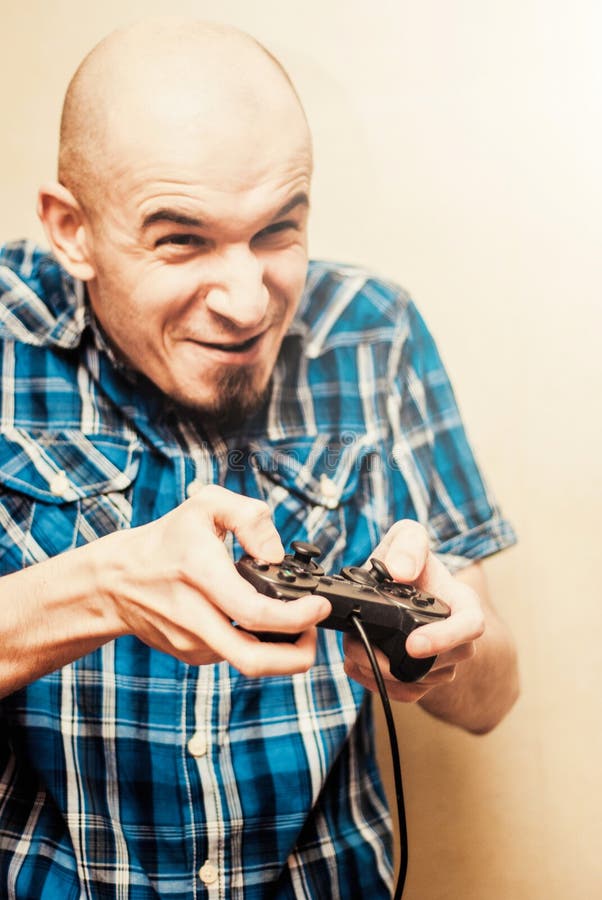 Happy Man Playing on the Joystick in a Game Console Stock Photo - Image ...