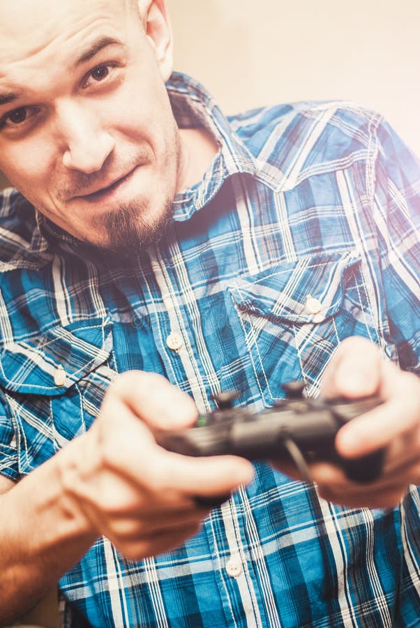 Happy Man Playing on the Joystick in a Game Console Stock Photo - Image ...
