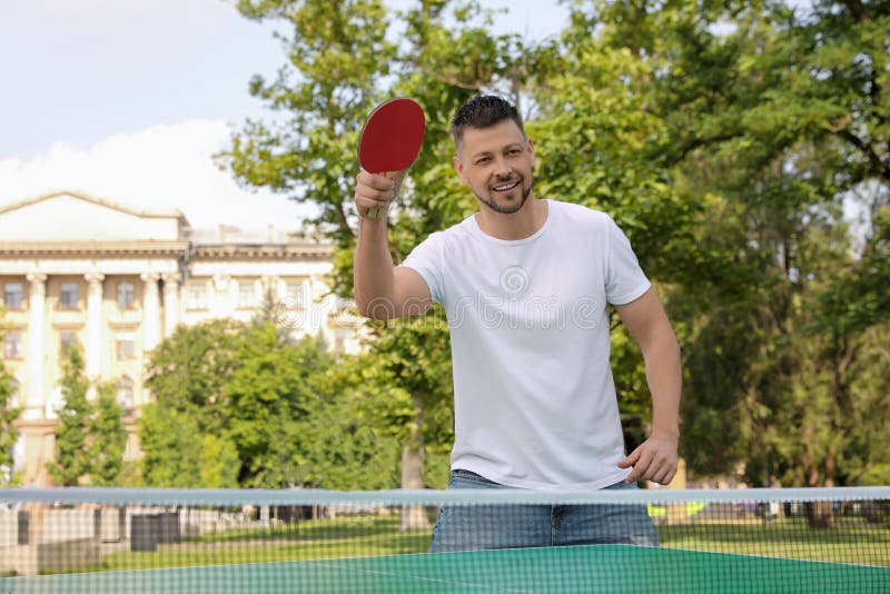 Happy Man Playing Ping Pong Outdoors on Summer Day Stock Image - Image ...