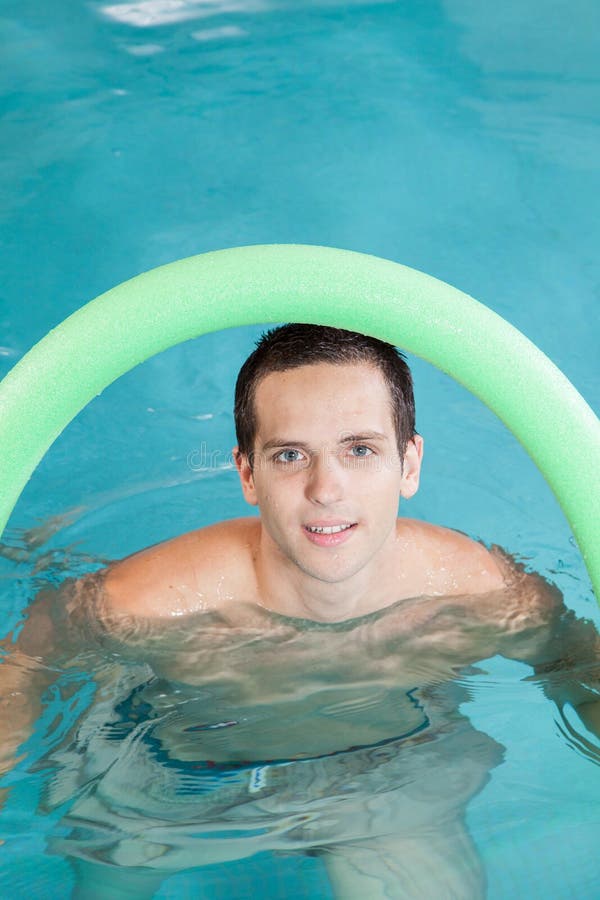 Happy Man Playing in the Pool Stock Image - Image of blue, athletic ...