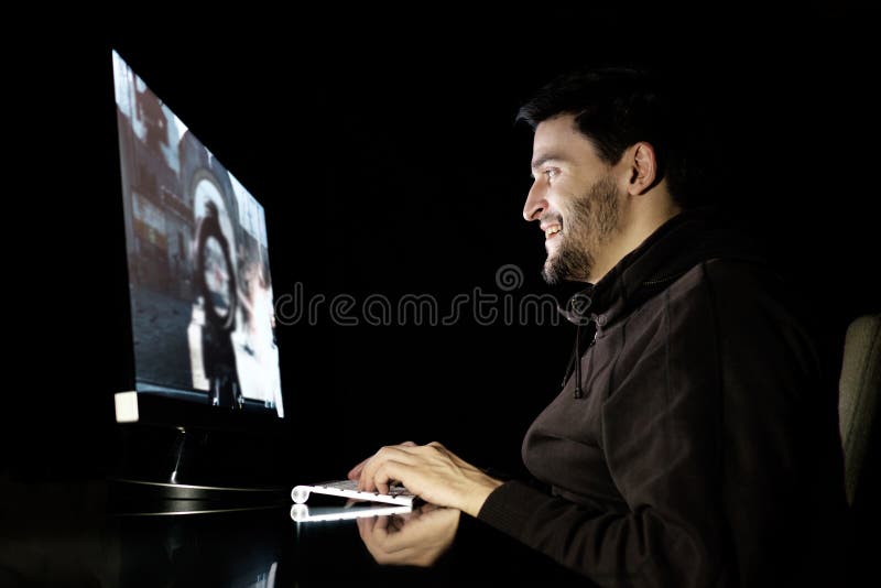 Happy Man Playing Videogame on Desktop Computer Stock Photo - Image of ...