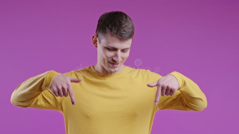 Happy Man Pointing Down To Advertising Area On Pink Guy Asking Click