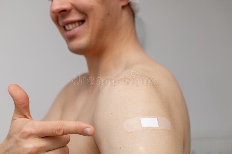 Happy Man Pointing at the Patch on Shoulder Stock Photo - Image of ...