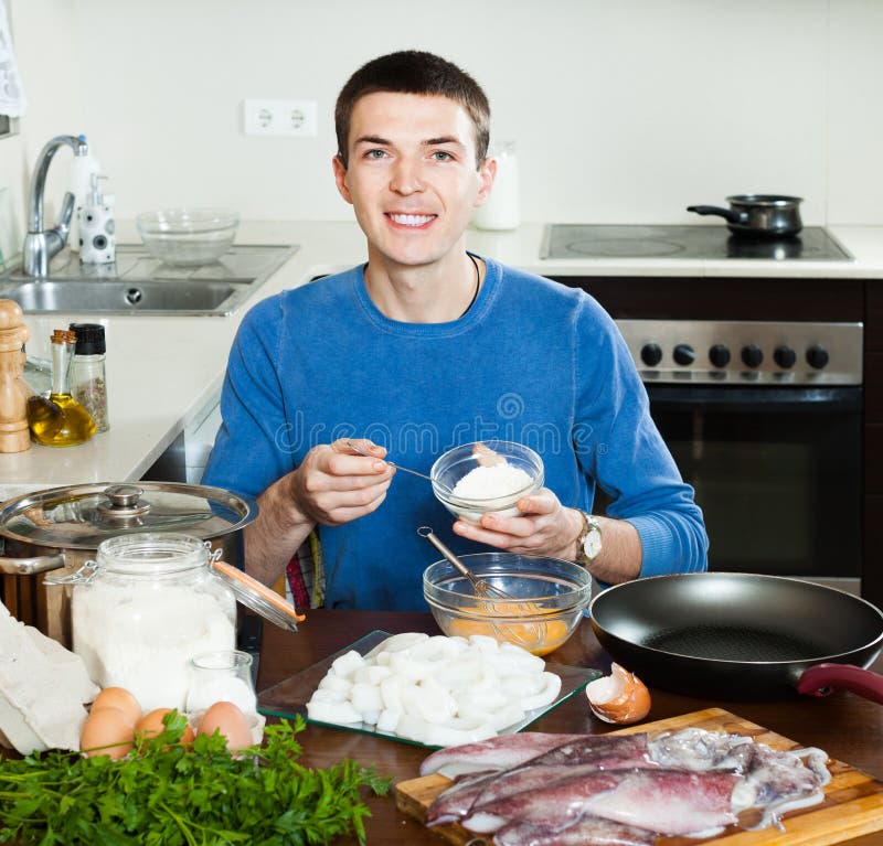 Happy man preparing batter stock image. Image of home - 39178617