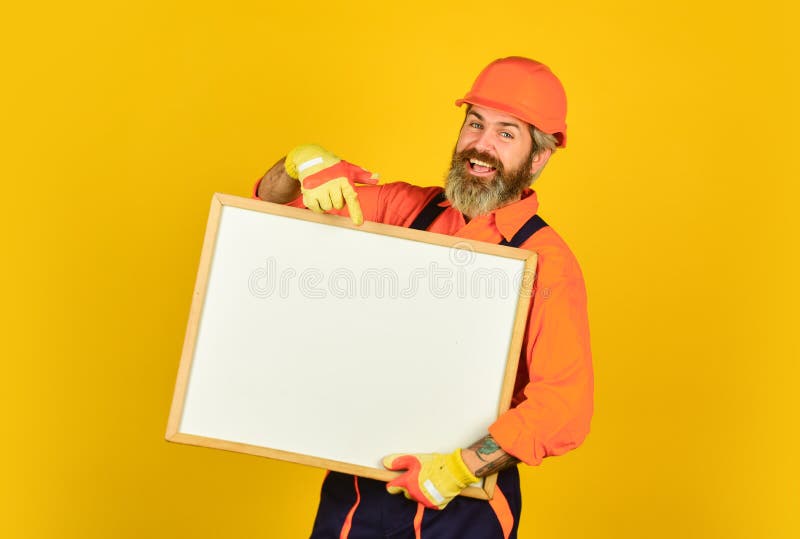 Happy Man with Presentation. Builder Points To Flipchart. Architect ...