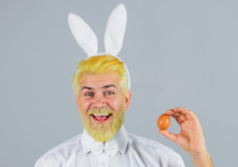 Man in Rabbit Ears with Easter Egg. Spring Holidays. Hunting Eggs ...