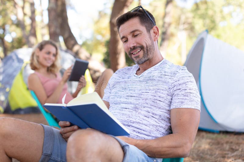 Happy man reading book stock photo. Image of backpacking - 210147678 Happy man reading book stock photo. Image of backpacking - 210147678