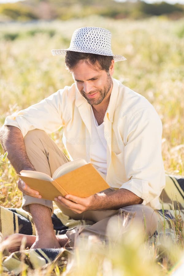 Happy man reading a book stock photo. Image of literature - 50465094 Happy man reading a book stock photo. Image of literature - 50465094