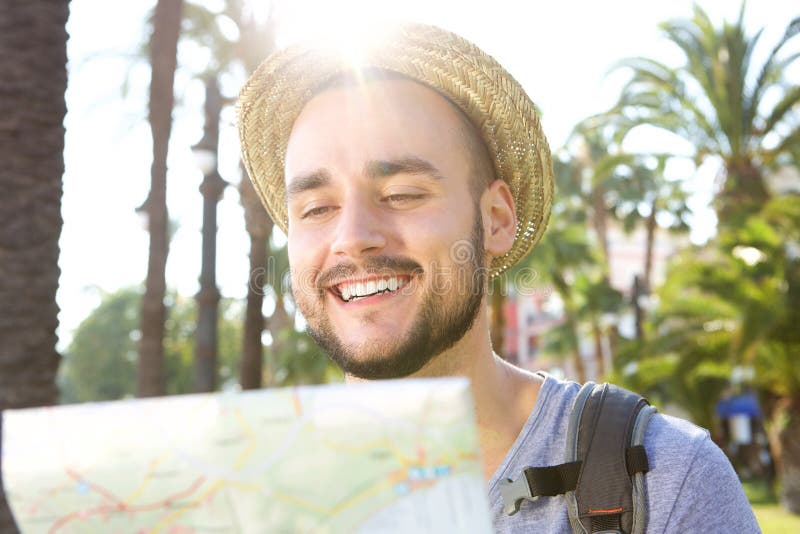 Happy Man Reading Map while on Vacation Stock Image - Image of park ...