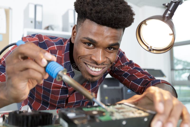 Happy Man Repairing Computer Laptop Stock Photo - Image of computer ...