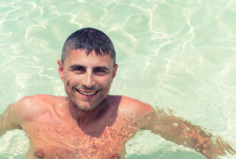 Happy Man in 40s Relaxing in Tropical Water Stock Image - Image of ...